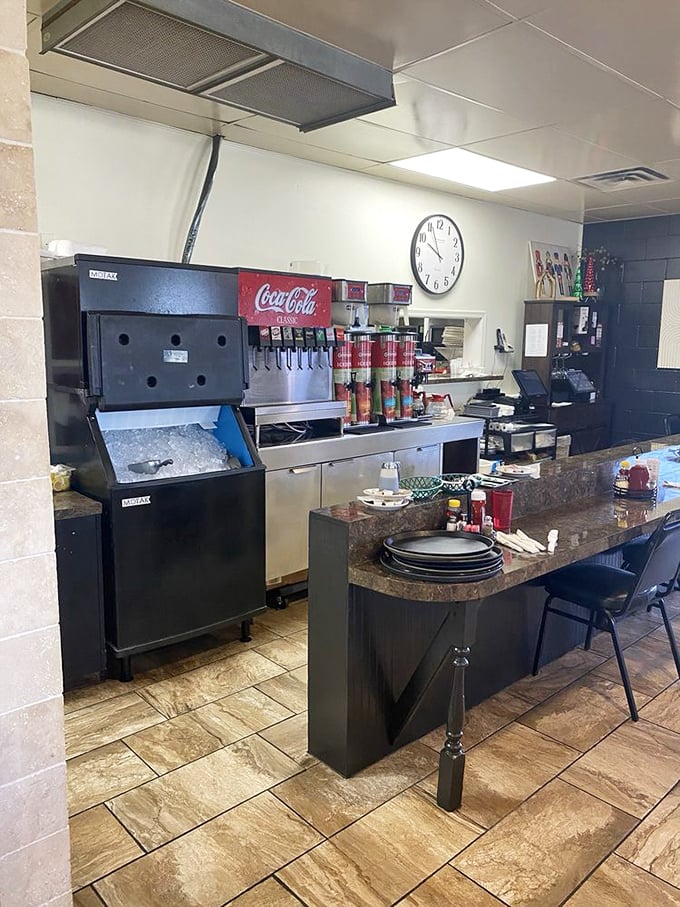 The beating heart of any good diner: the soda fountain and counter where regulars perch and waitresses call you "hon" without irony.