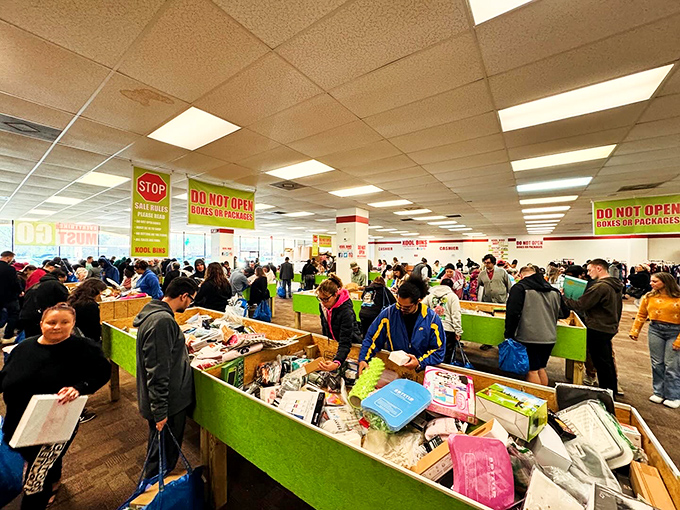 The thrill of the hunt in action! Bin-diving enthusiasts demonstrate why Kool Bins has become Norfolk's most addictive shopping experience.