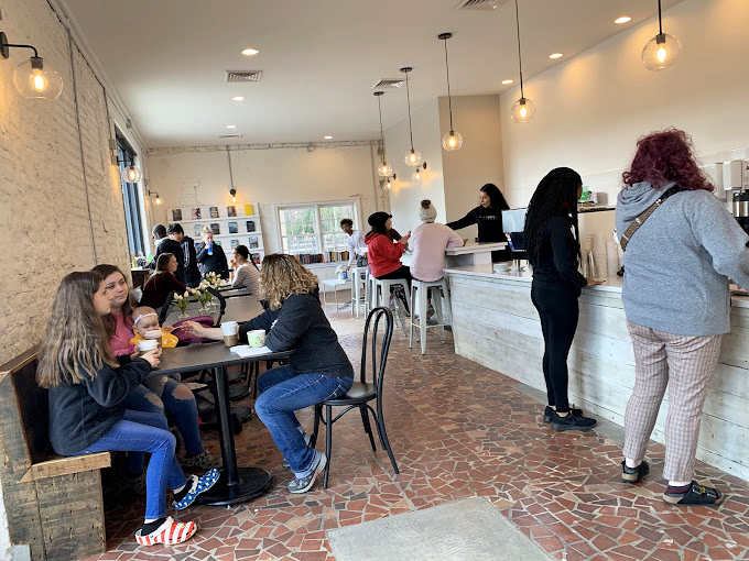 The true measure of a great caf&eacute;: when the tables are full and everyone looks like they've found their happy place.