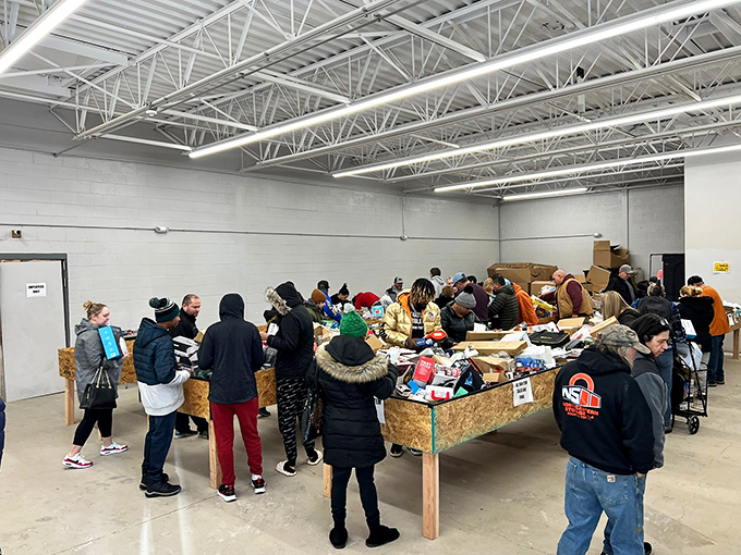 The bin store in full swing looks like a friendly competition where everyone wins—shoppers united in the universal language of scoring an incredible deal.