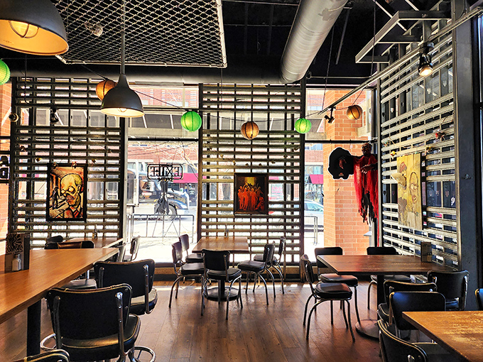 The latticed dividers and hanging lanterns create cozy dining zones, perfect for intimate conversations about your zombie survival plan over gourmet burgers.