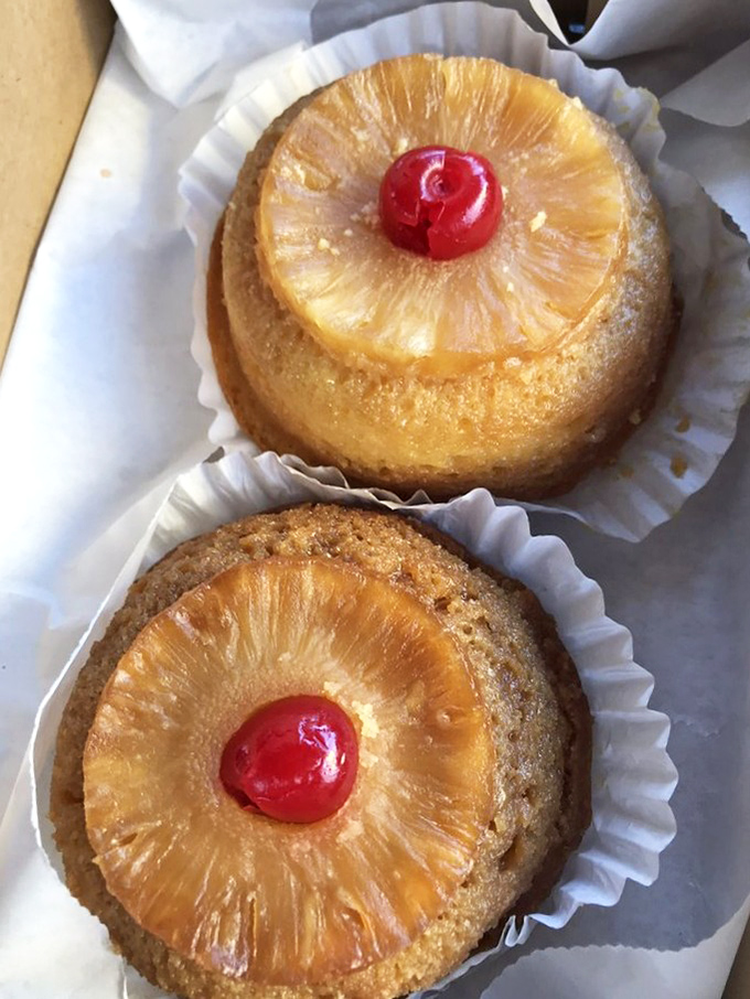 Pineapple upside-down cakes that your grandmother would approve of, complete with that maraschino cherry on top that's both decoration and delicious punctuation mark.