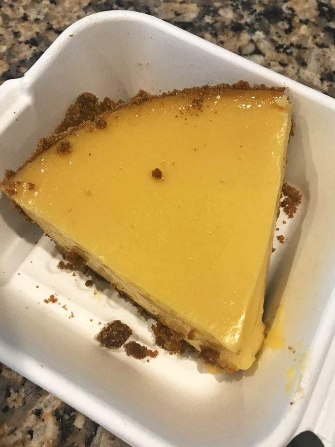 This key lime slice sits in quiet perfection, its sunny yellow surface promising tangy bliss. Resistance is futile.