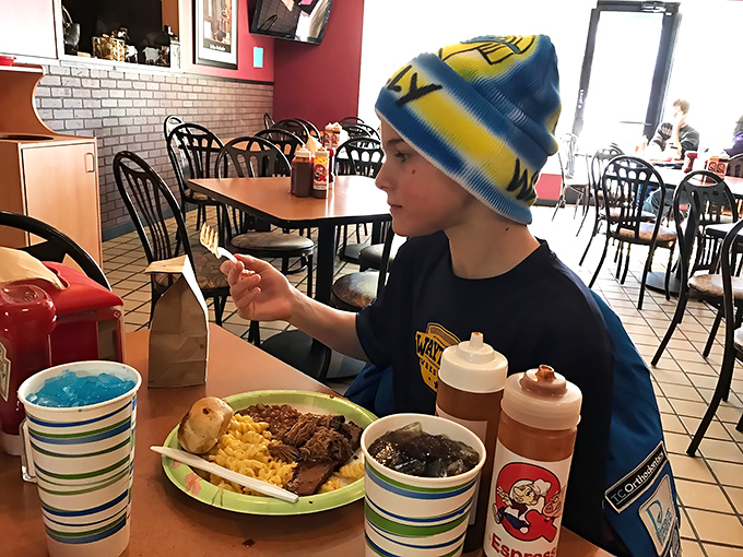 Multi-generational BBQ appreciation in action. Teaching the young ones early that good food is worth sitting still for.