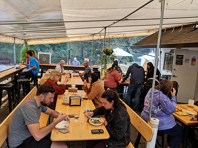 The covered patio at Sugarpine&mdash;where strangers become friends united by the universal language of "Oh my god, try this!"