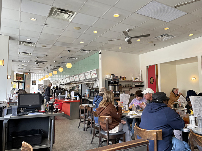 Where strangers become neighbors over plates of eggs and shared newspaper sections. The Majestic's dining room has witnessed more Atlanta stories than the local news.