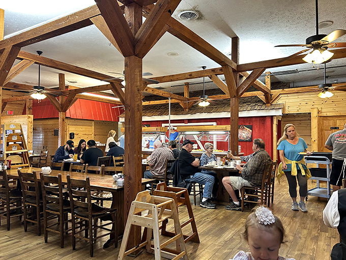 The bustling dining room where pancake dreams come true. Wood beams overhead, happy diners below, and the promise of maple syrup in the air.