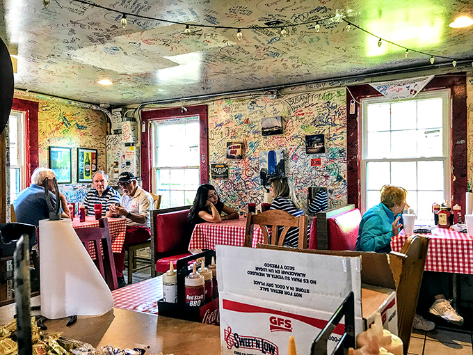 The wall-to-wall signatures from satisfied customers tell the real story&mdash;these folks didn't just eat barbecue; they experienced a Kentucky revelation worth commemorating.