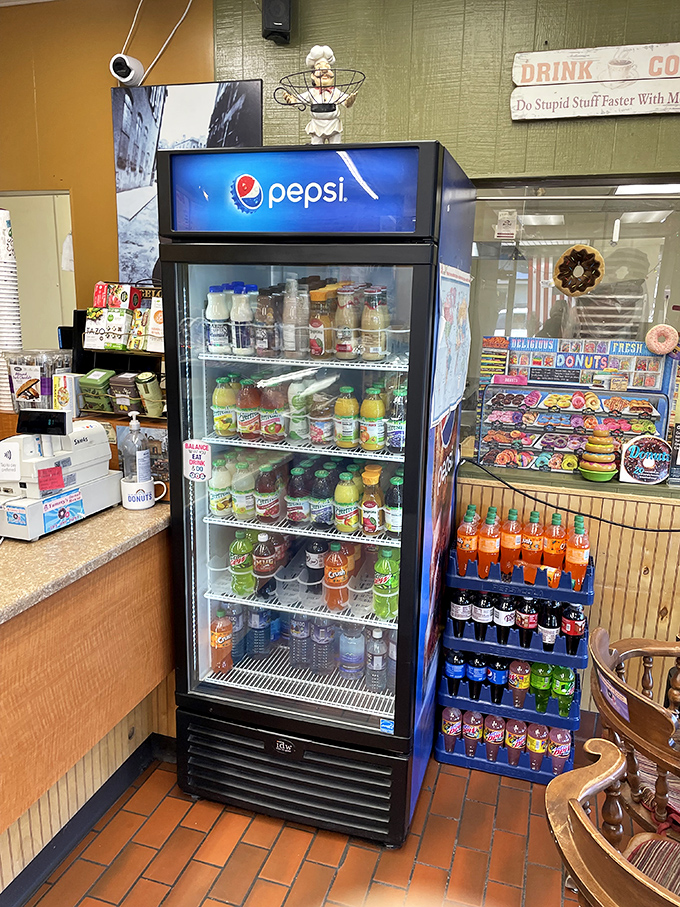 The beverage case stands ready to help wash down your donut decisions. Because great pastry deserves proper hydration&mdash;it's just science.
