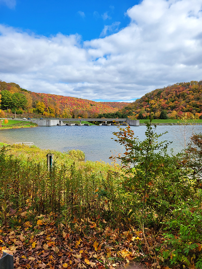 Autumn paints the landscape in impossible colors. Fall foliage reflected in the still waters creates a double dose of seasonal magic.