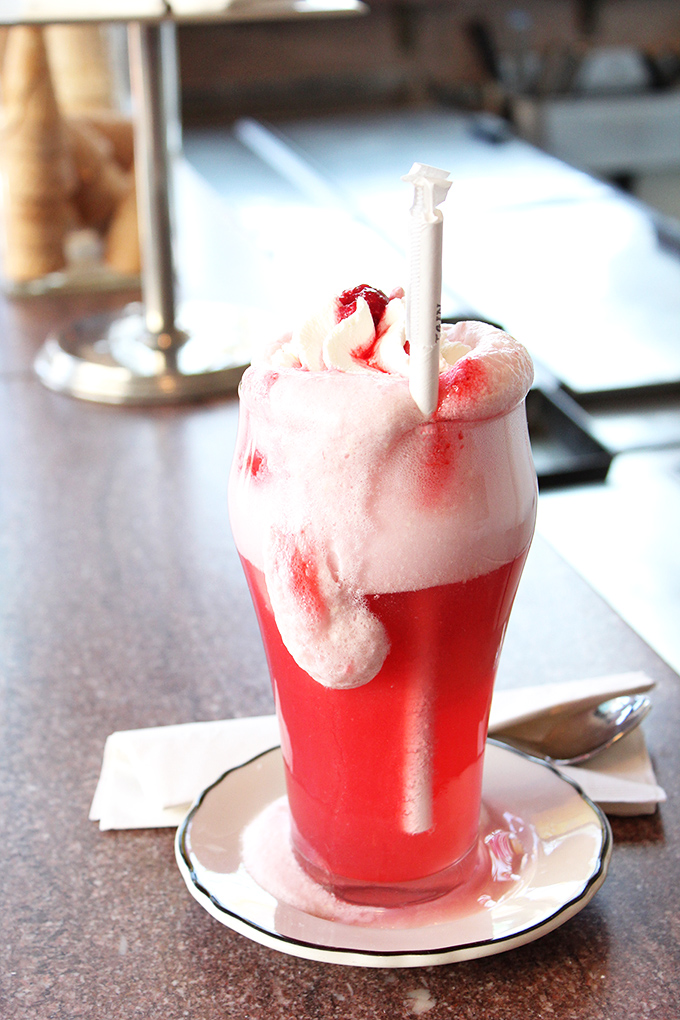 A fizzy, creamy concoction that makes you wonder why we ever invented other beverages. Nostalgia in liquid form. 