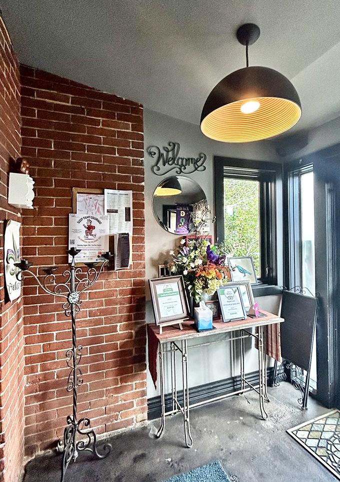 An entrance that promises culinary adventure beyond its threshold. Awards on display&mdash;spoiler alert for the deliciousness that awaits.