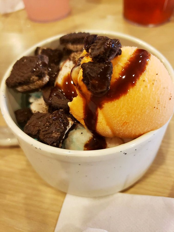 Ice cream with cookie crumbles &ndash; because after conquering three plates of dinner, you've earned the right to build your own dessert masterpiece.