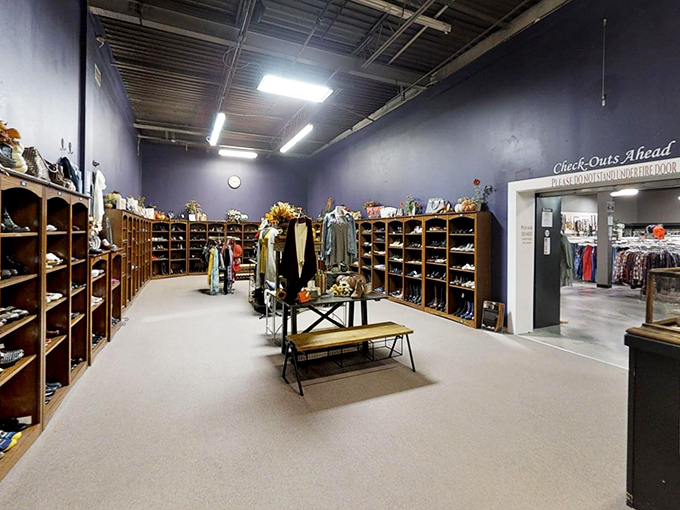 The shoe section stretches toward checkout like a wonderland of footwear possibilities. Those purple walls have seen countless "perfect fit" moments.