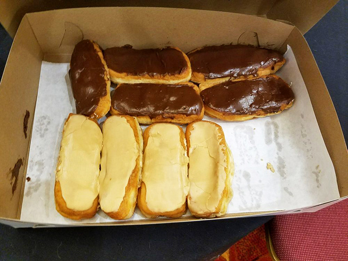 Long Johns lined up like edible exclamation points, half declaring chocolate supremacy, half championing vanilla excellence. Why choose when you can have both?