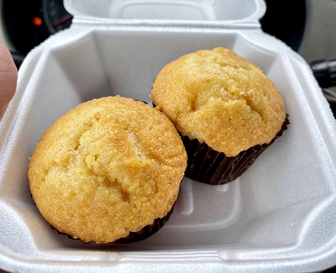 Golden cornbread muffins that hover between dessert and side dish. The perfect supporting act in the chicken symphony.