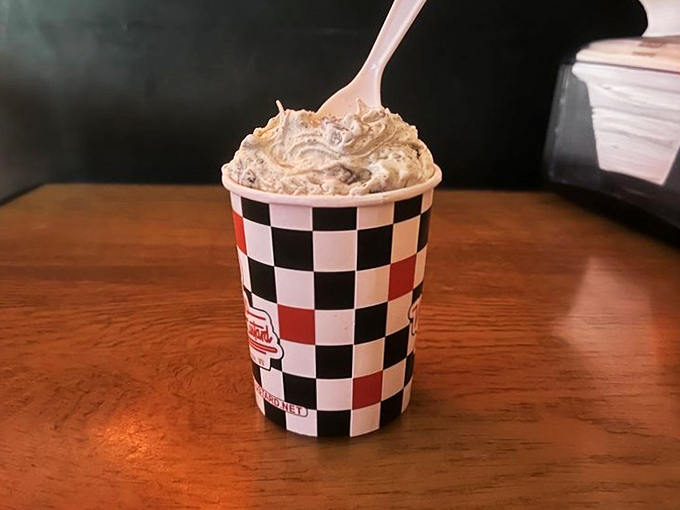 The Oreo Concrete: where cookies go to fulfill their destiny! It's so thick, you could probably use it as mortar to build a house of dessert dreams.