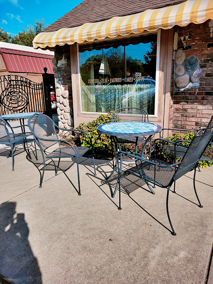 Alfresco dining with fairy tale charm. This mosaic-topped table offers the perfect perch for people-watching while savoring your sugary treasures.