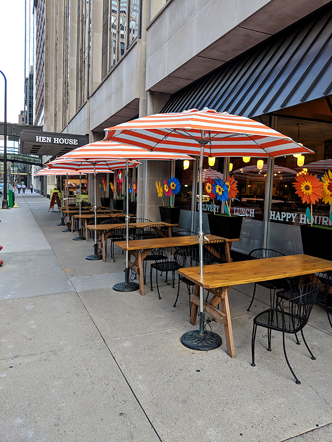 Outdoor seating with cheerful umbrellas that laugh in the face of Minneapolis weather. Urban dining with a side of people-watching.