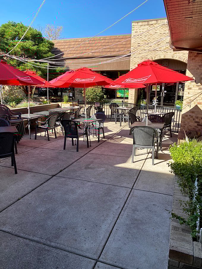 The outdoor patio where summer evenings stretch into the perfect blend of Colorado weather and Italian hospitality&mdash;complete with umbrella shade for those serious about their al fresco dining.