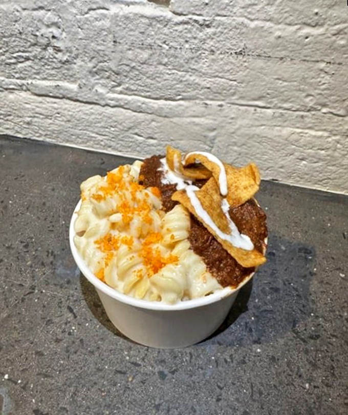 The facade announces its purpose with no pretense: "BBQ" is all you need to know, while that wood cage hints at the flavor alchemy happening inside. 