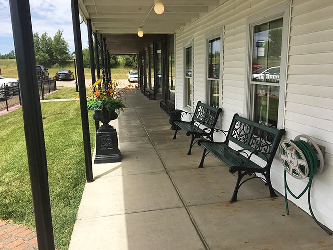 A front porch made for contemplating life's big questions, like "How soon is too soon to come back for more chicken?"