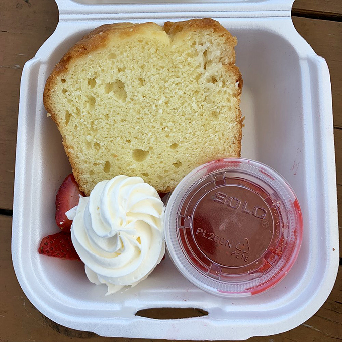 Pound cake so buttery and moist it doesn't need the strawberry sauce and whipped cream, but accepts these companions with gracious dignity.