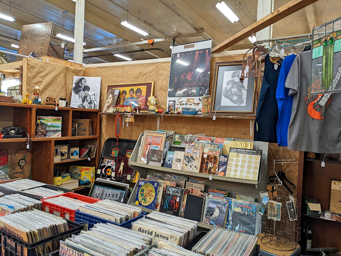 Vinyl enthusiasts can spend hours flipping through these record crates, hunting for that forgotten album that defined their youth.