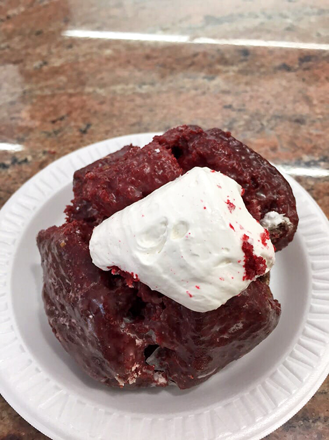 Red velvet donuts topped with cream cheese frosting prove that sometimes the most photogenic foods also taste the best&mdash;this isn't just breakfast, it's edible art.