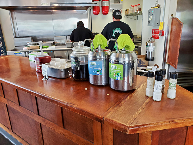 The condiment station: where tartar sauce and malt vinegar stand ready to elevate your fried fish experience to legendary status.