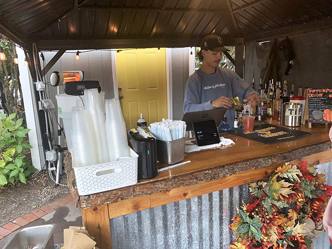 Where liquid happiness is crafted with care. This outdoor bar proves that sometimes the best dining experiences happen under open skies.