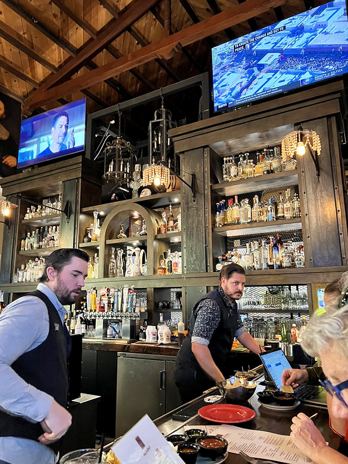 Behind every great taco is a team of dedicated professionals. These bartenders craft margaritas with the precision of scientists and the soul of artists.