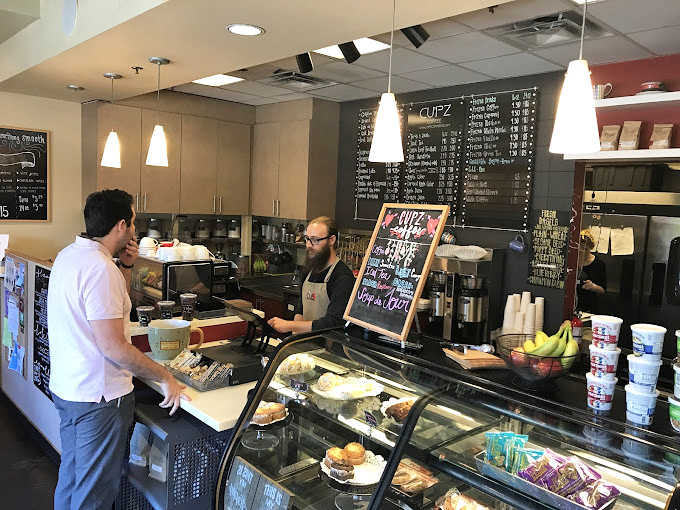 Where coffee dreams come true. The display case tempts with pastries while skilled baristas transform ordinary beans into extraordinary experiences&mdash;the ultimate coffee theater.