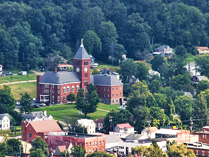 The historic Cameron County Courthouse stands sentinel over Emporium, where small-town governance means your voice actually matters.