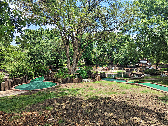 The mini-golf course's natural setting offers a serene backdrop for family putting competitions, where trees witness both triumph and the occasional tantrum.