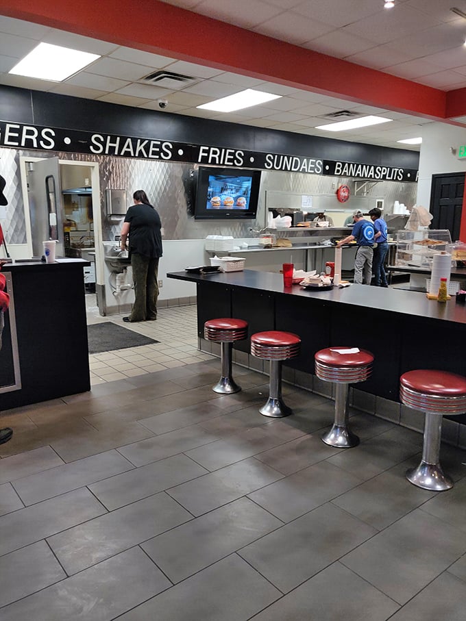 The open kitchen concept before it was trendy. This is where humble ingredients transform into the dishes that keep locals coming back for decades.