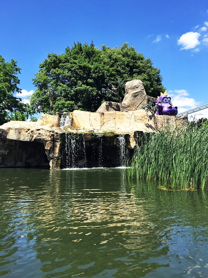 The castle entrance stands as a promise that beyond these walls, the ordinary rules of adulthood are temporarily suspended. Magic awaits.