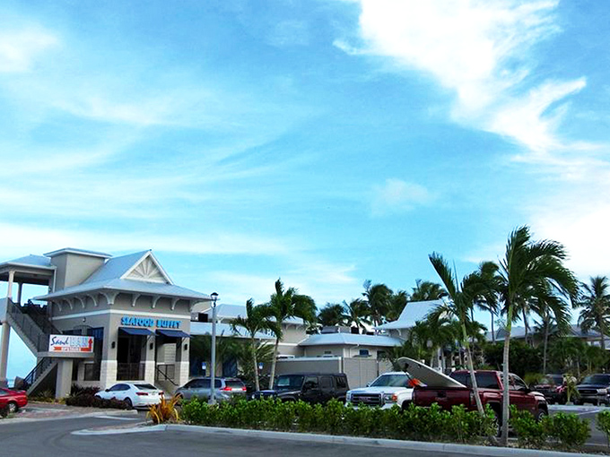 A gleaming white sanctuary of seafood awaits at Whale Harbor, standing like a maritime palace against the Florida Keys sky.