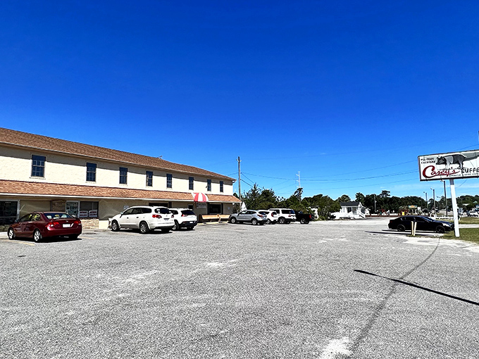 The unassuming exterior of Casey's Buffet hides a Southern food paradise within. Like finding a treasure chest disguised as an ordinary box.