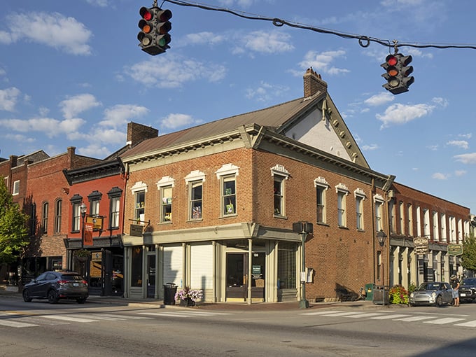 Bardstown's historic brick buildings stand like sentinels of time, watching over the charming downtown intersection where stories unfold daily.