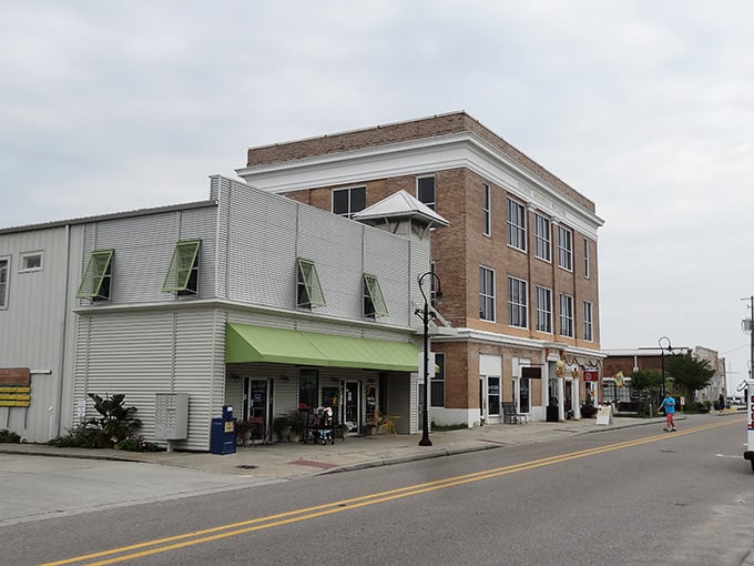 Downtown Bay St. Louis showcases that perfect small-town charm where brick buildings and green awnings tell stories of Mississippi's coastal heritage.