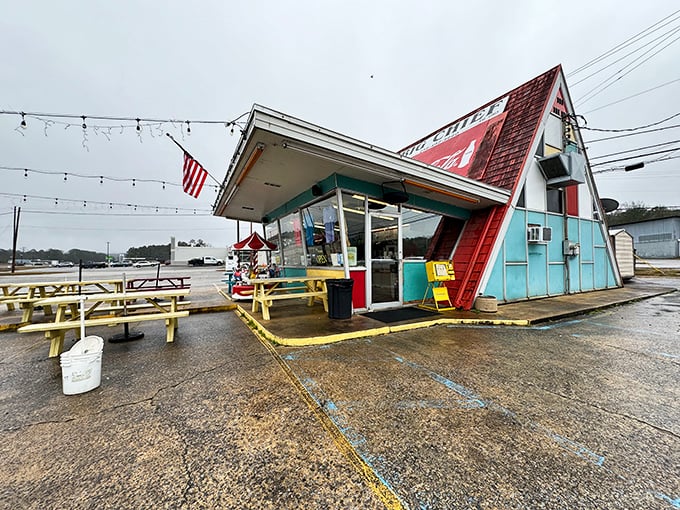 The A-frame paradise at Big Chief Drive-In looks like a Wes Anderson set designed by someone who really, really loves burgers.