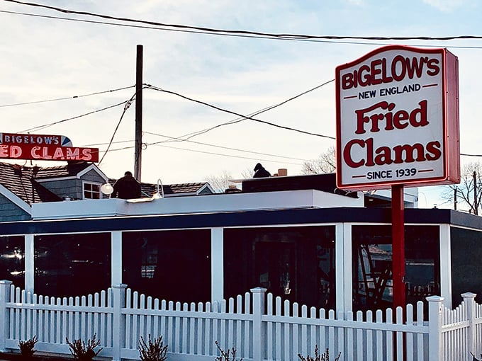 Bigelow's iconic red sign has been calling seafood lovers since 1939. That white picket fence isn't keeping anyone away from those legendary fried clams!