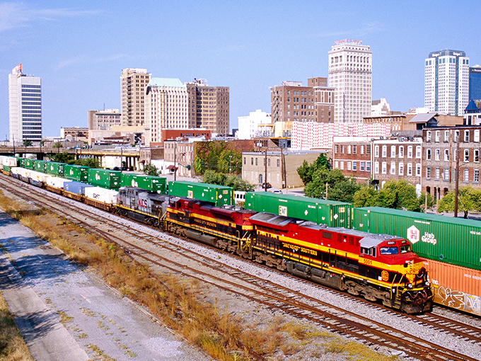 Birmingham's skyline stands proud as a freight train rumbles through &ndash; where industrial heritage meets modern Southern charm.