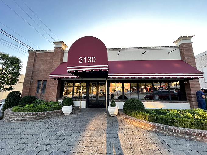 The iconic burgundy awning of Bones welcomes you like a red carpet to Atlanta's steak royalty.