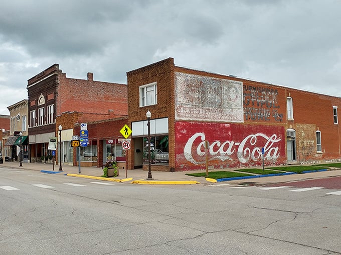 Historic downtown Council Grove, where that vintage Coca-Cola mural isn't just advertising &ndash; it's practically the town's unofficial welcome sign!
