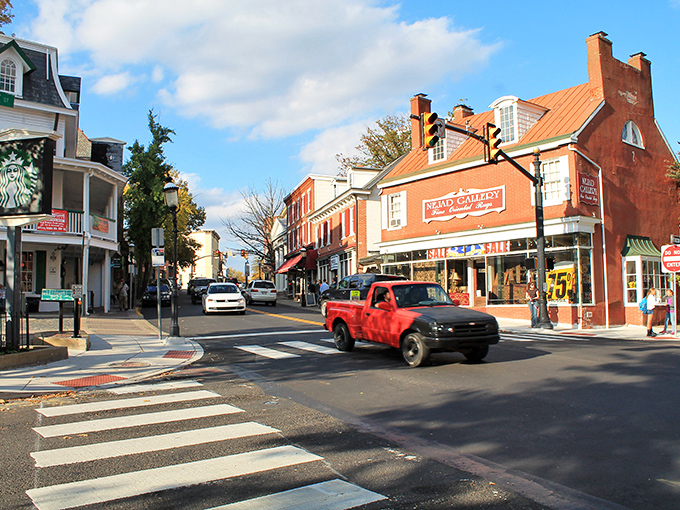 Doylestown's Main Street – where Starbucks somehow looks like it's been there since 1776. Small-town charm with big-city coffee!