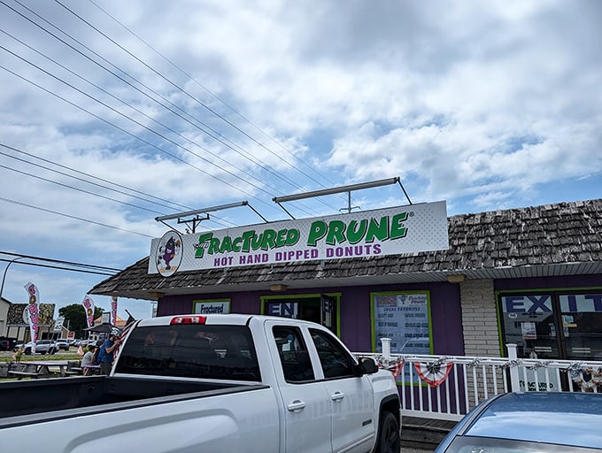 The name might raise eyebrows, but that purple and green storefront promises donut magic that'll make your taste buds do cartwheels.