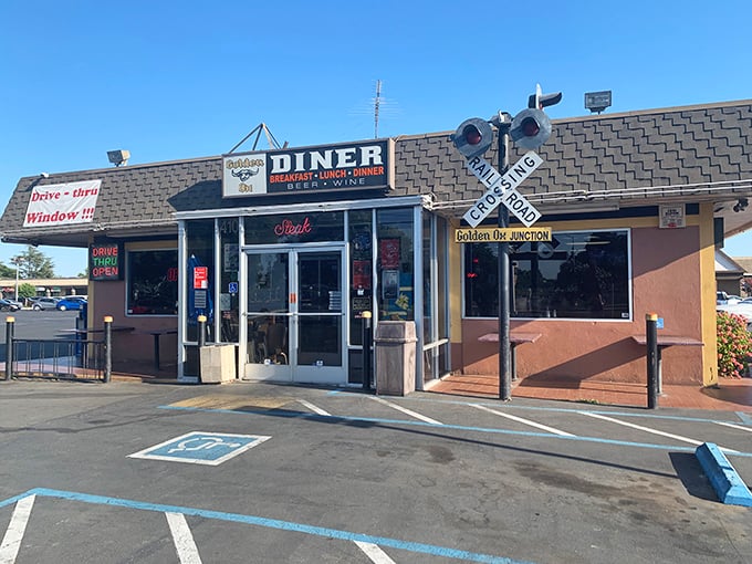 The Golden Ox Diner's exterior promises classic comfort food with a side of nostalgia. That airplane propeller isn't just for show!