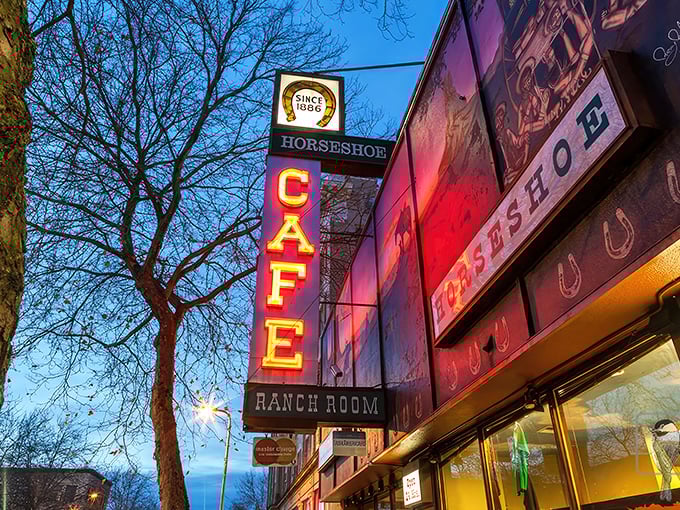 The iconic neon sign of Horseshoe Caf&eacute; glows like a beacon for breakfast lovers, promising culinary adventures since before color TV was invented.